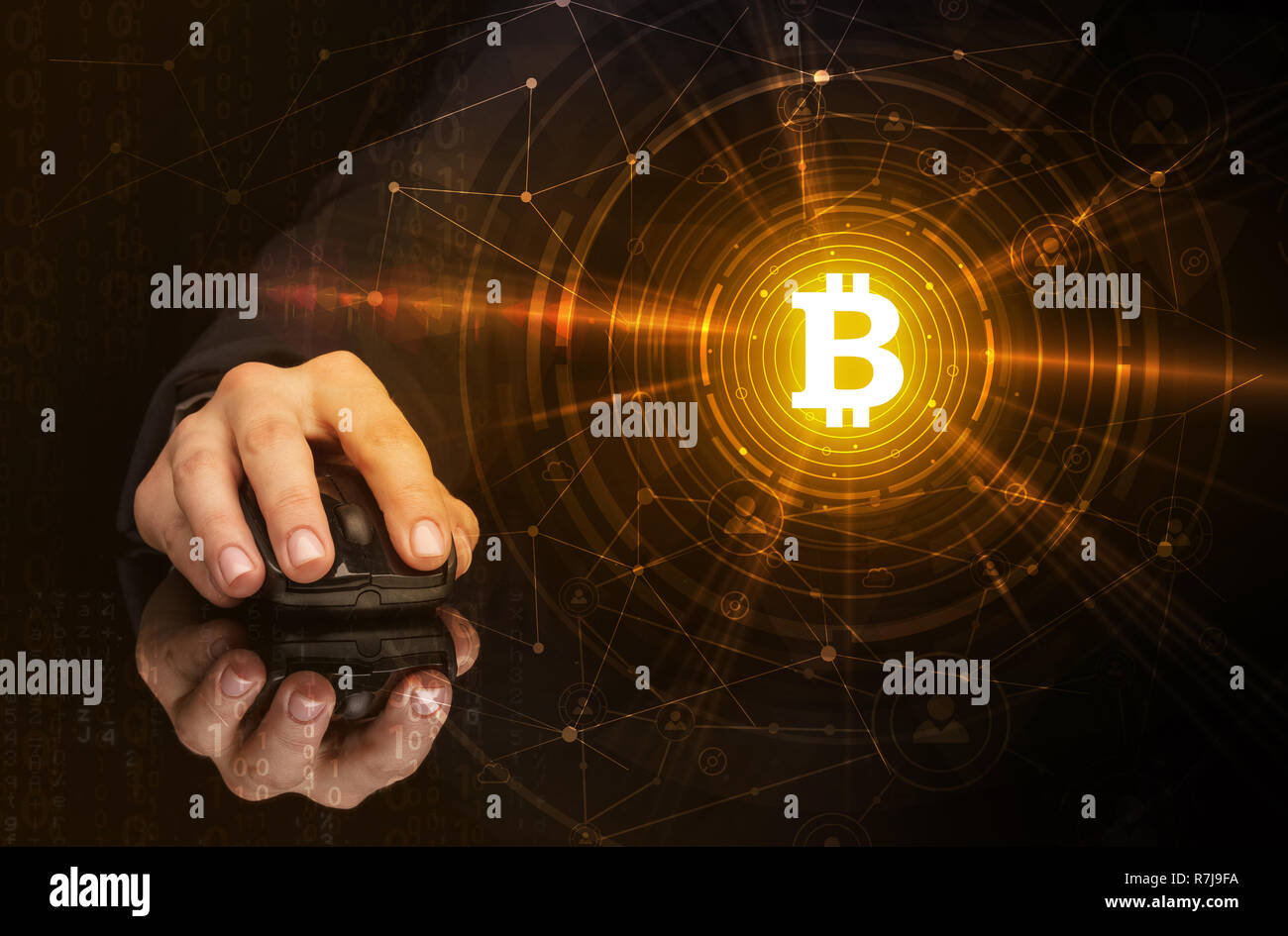 Hand using wireless mouse with cryptocurrency concept on dark ...