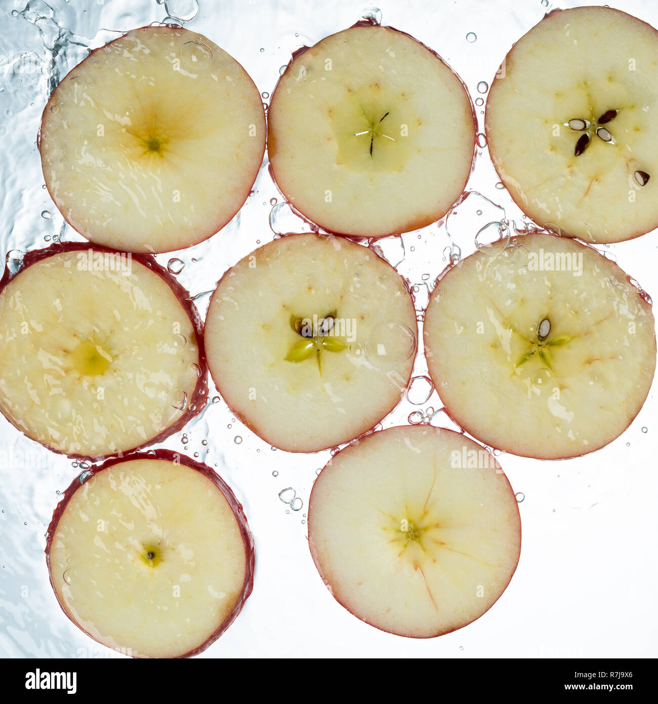 Apples Water Splash on White Background Stock Photo - Alamy