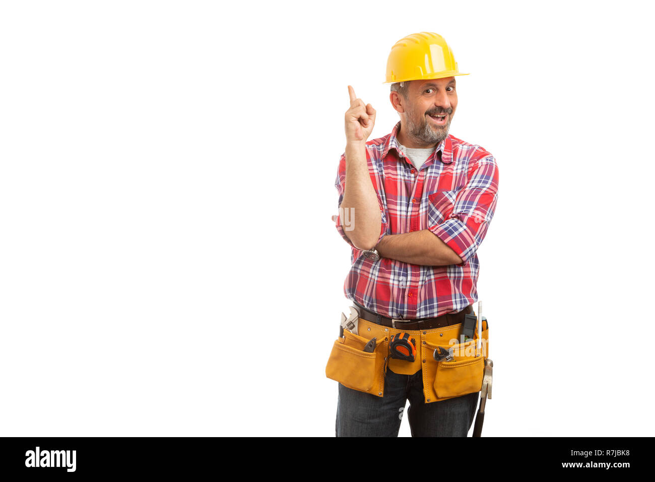 Happy constructor with index finger up as having great idea gesture ...
