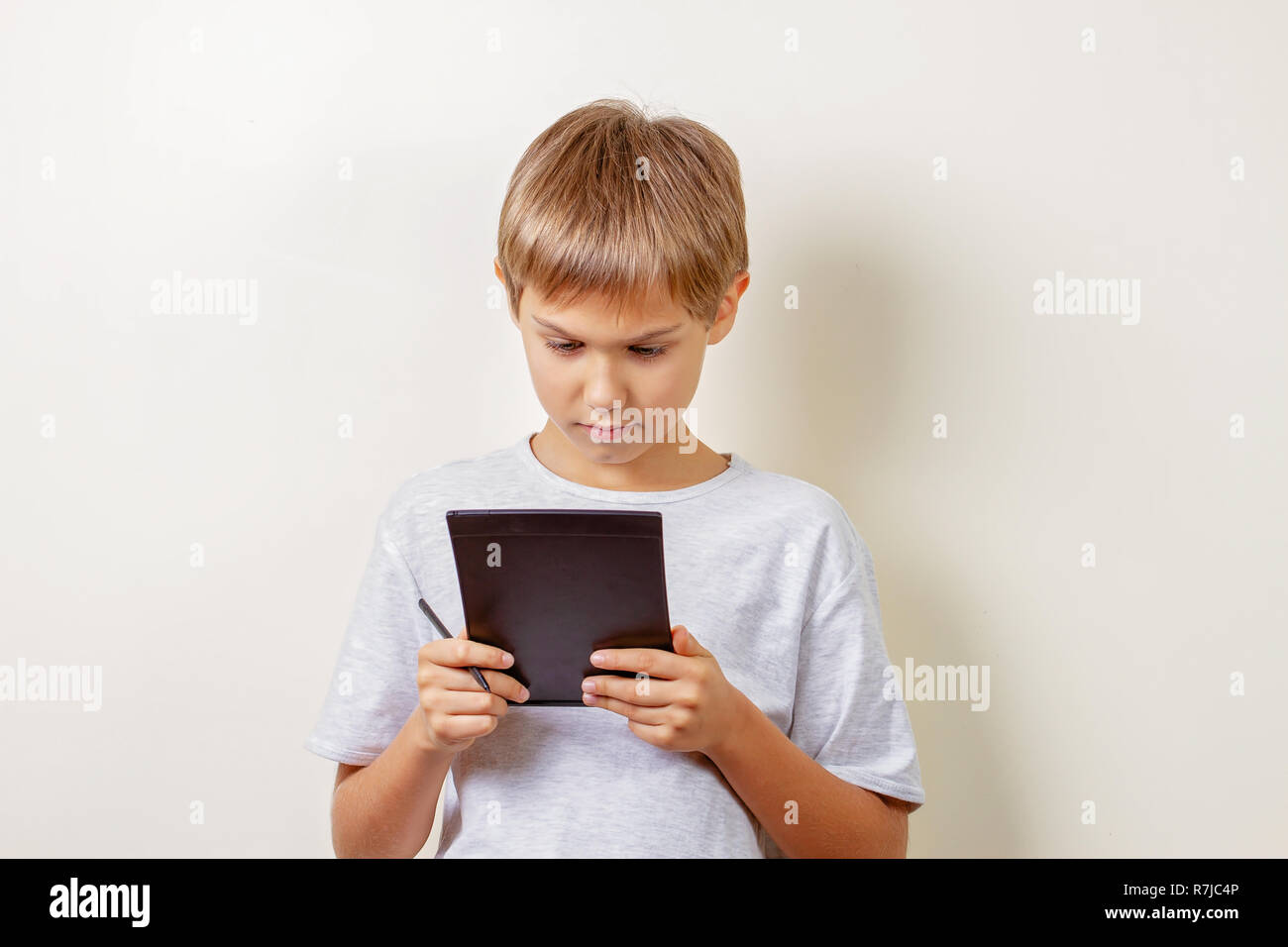 Kid tablet stylus hi-res stock photography and images - Alamy