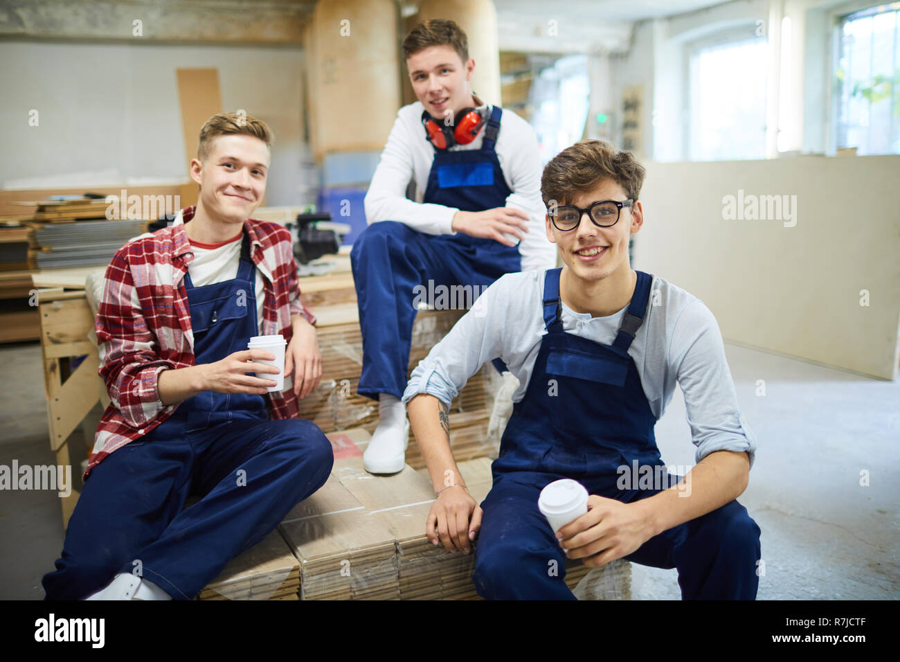Group of young workers at coffee break Stock Photo - Alamy