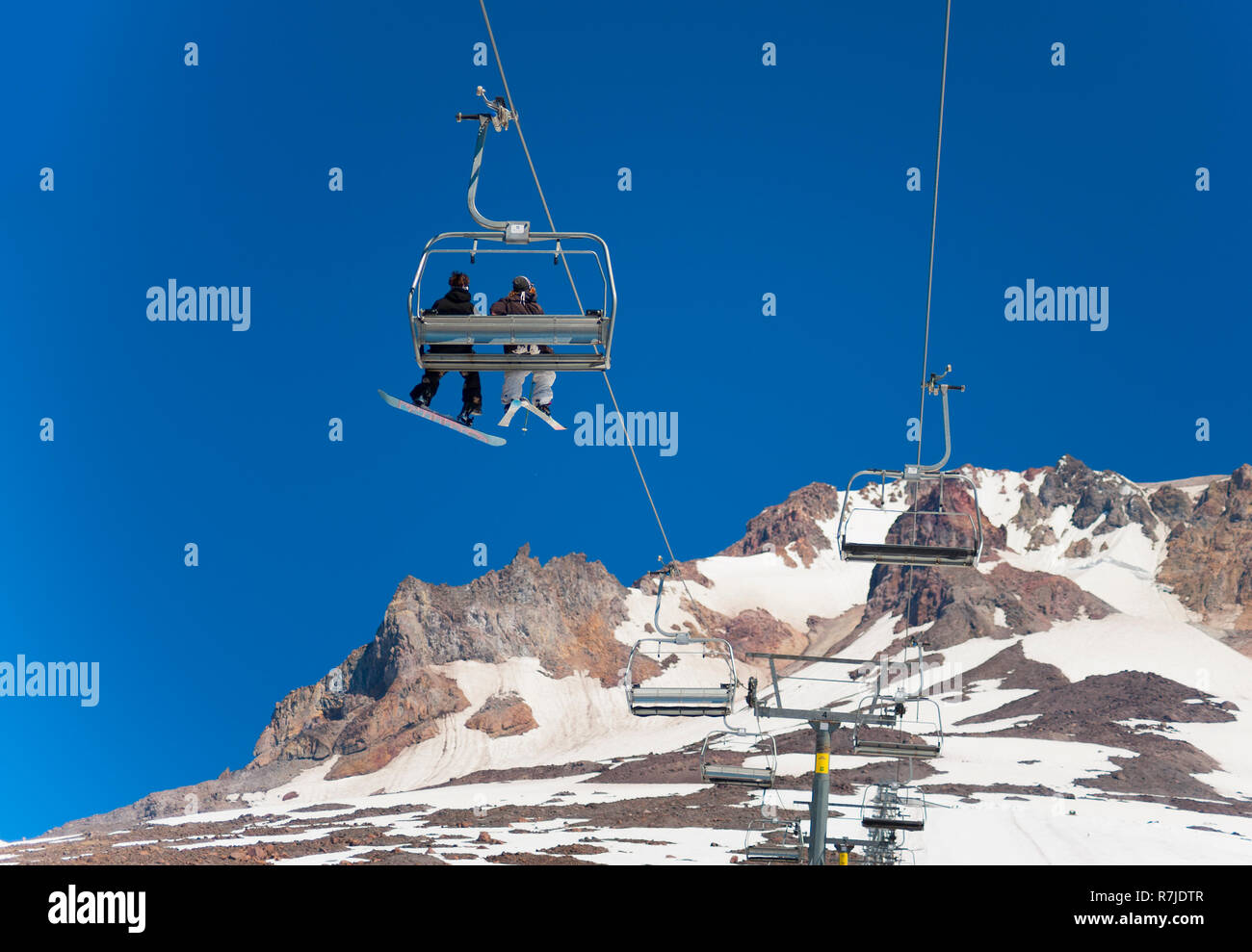 Government Camp, Oregon, USA - August 17, 2010: Snowboarders and skiers ...
