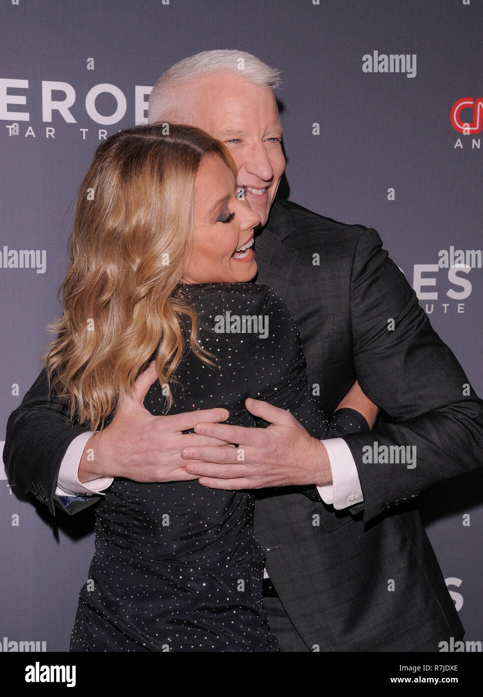 New York, NY - December 9, 2018: Kelly Ripa and Anderson Cooper attend ...