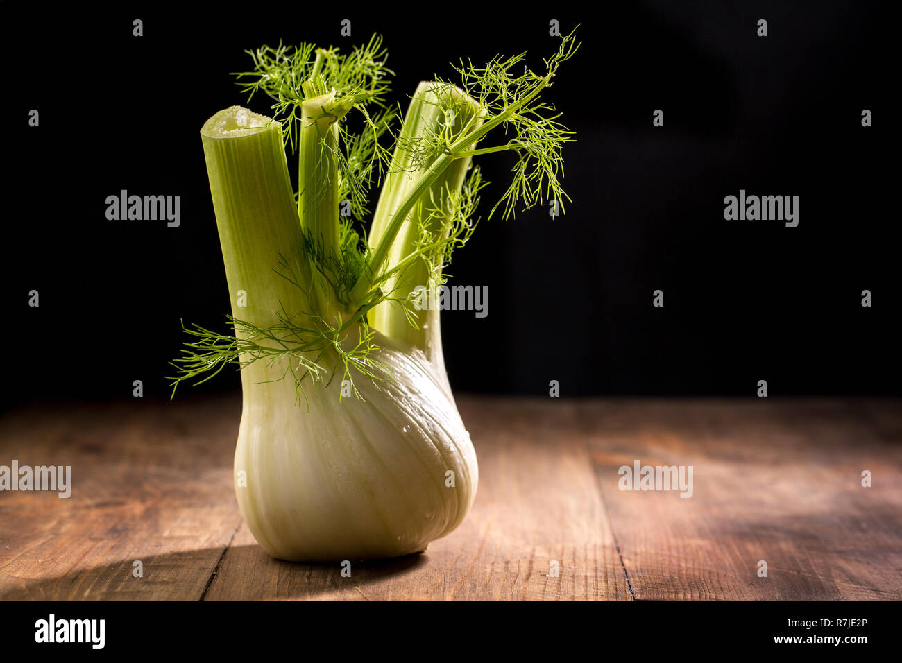 root fennel on a board Stock Photo - Alamy