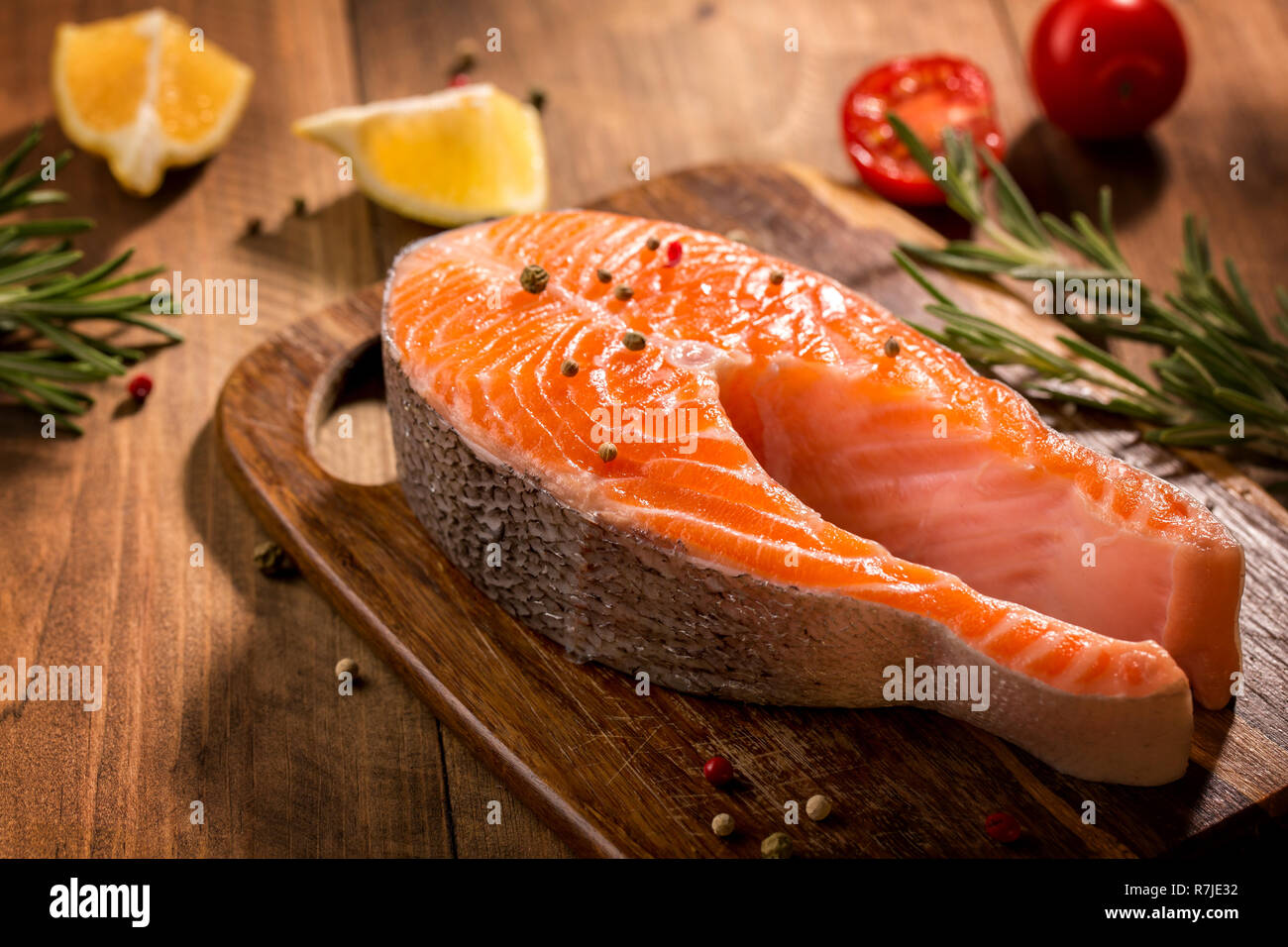 a piece of fish with spices Stock Photo - Alamy
