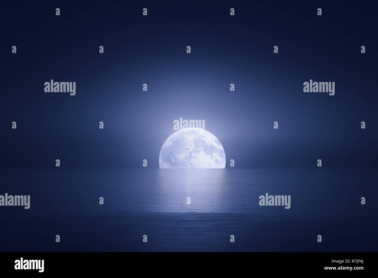 big moon over the sea at night Stock Photo - Alamy