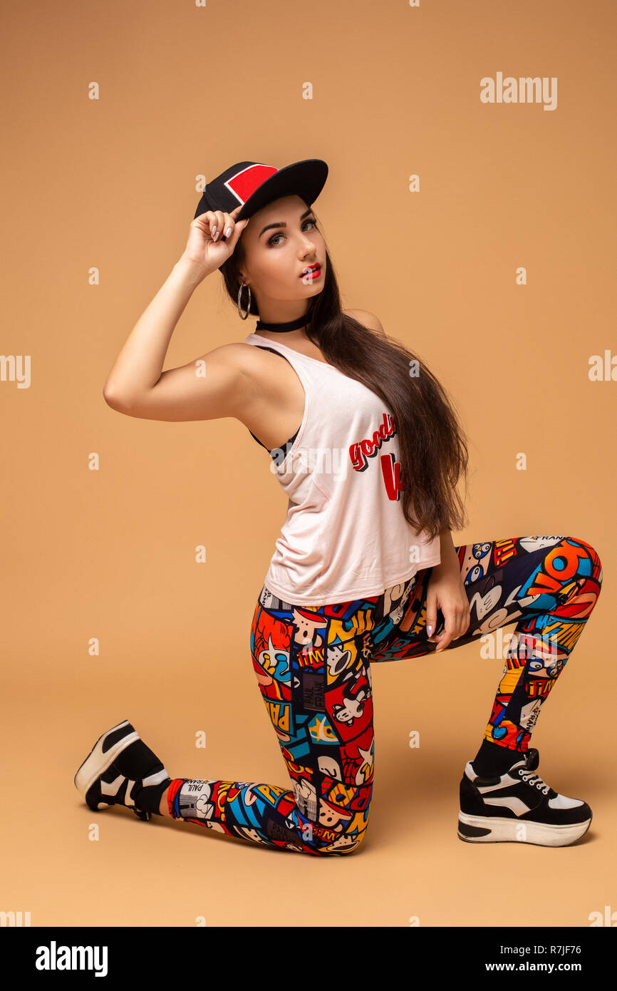 Young female dancer on studio background. Young modern style dancer ...