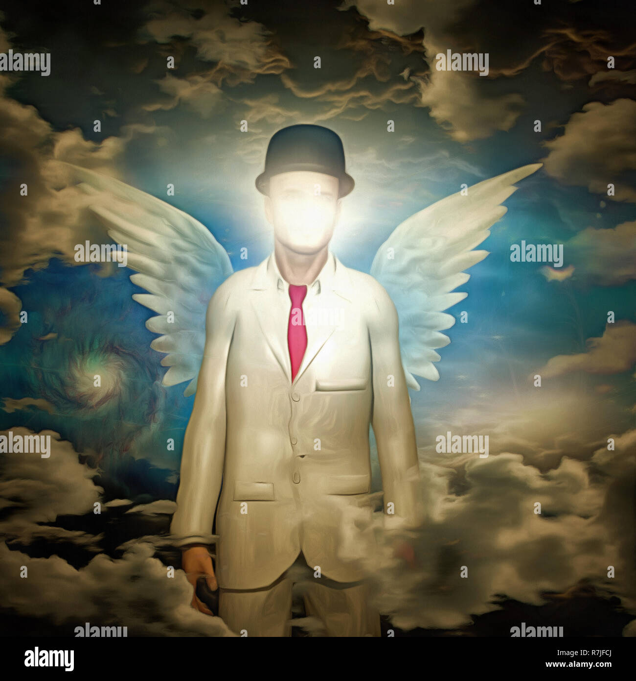 Man in white suit with angel wings Stock Photo - Alamy