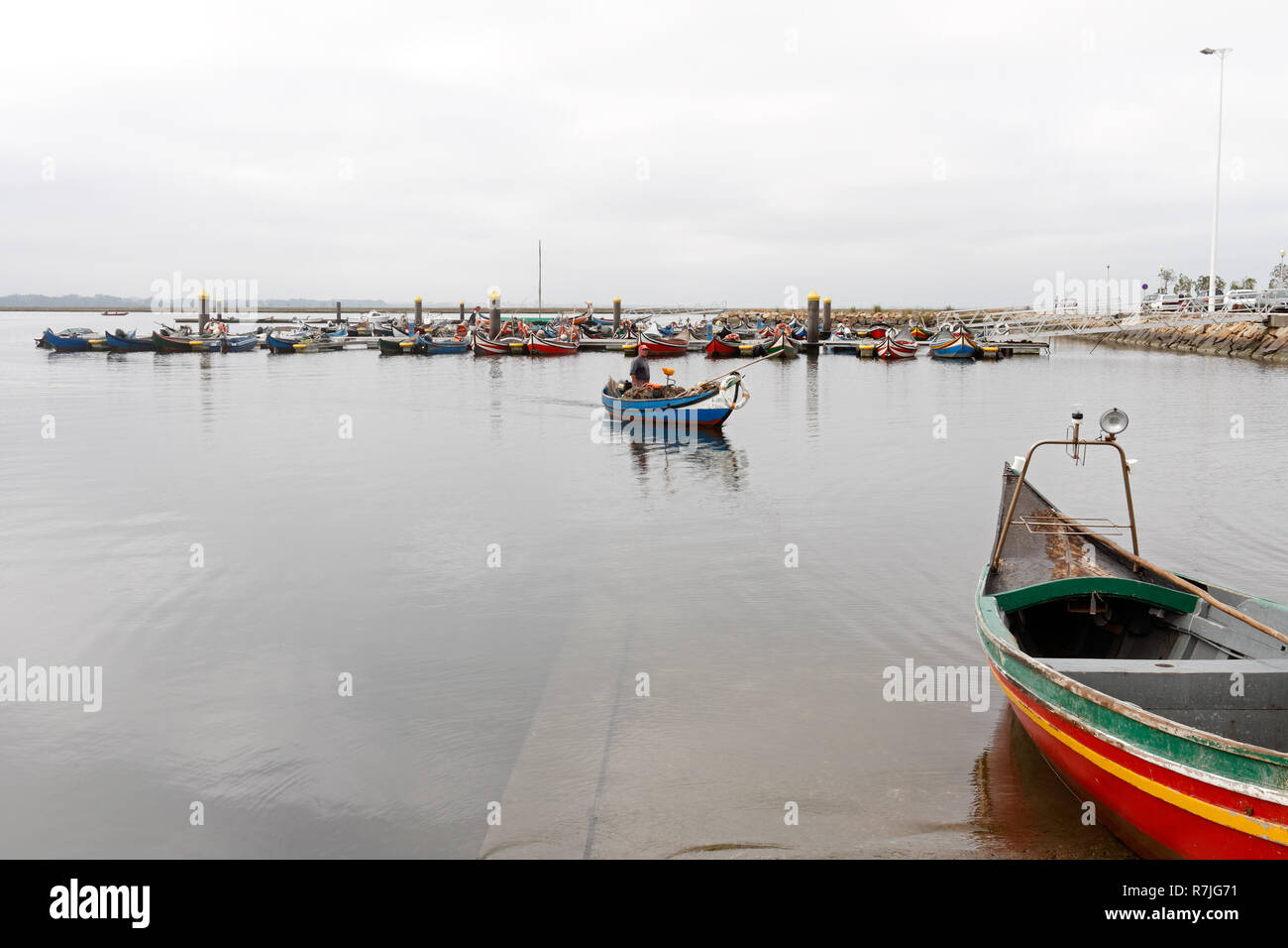 Typical boats in Ria de Aveiro (Portugal), Torreira Harbor, on July 31 ...