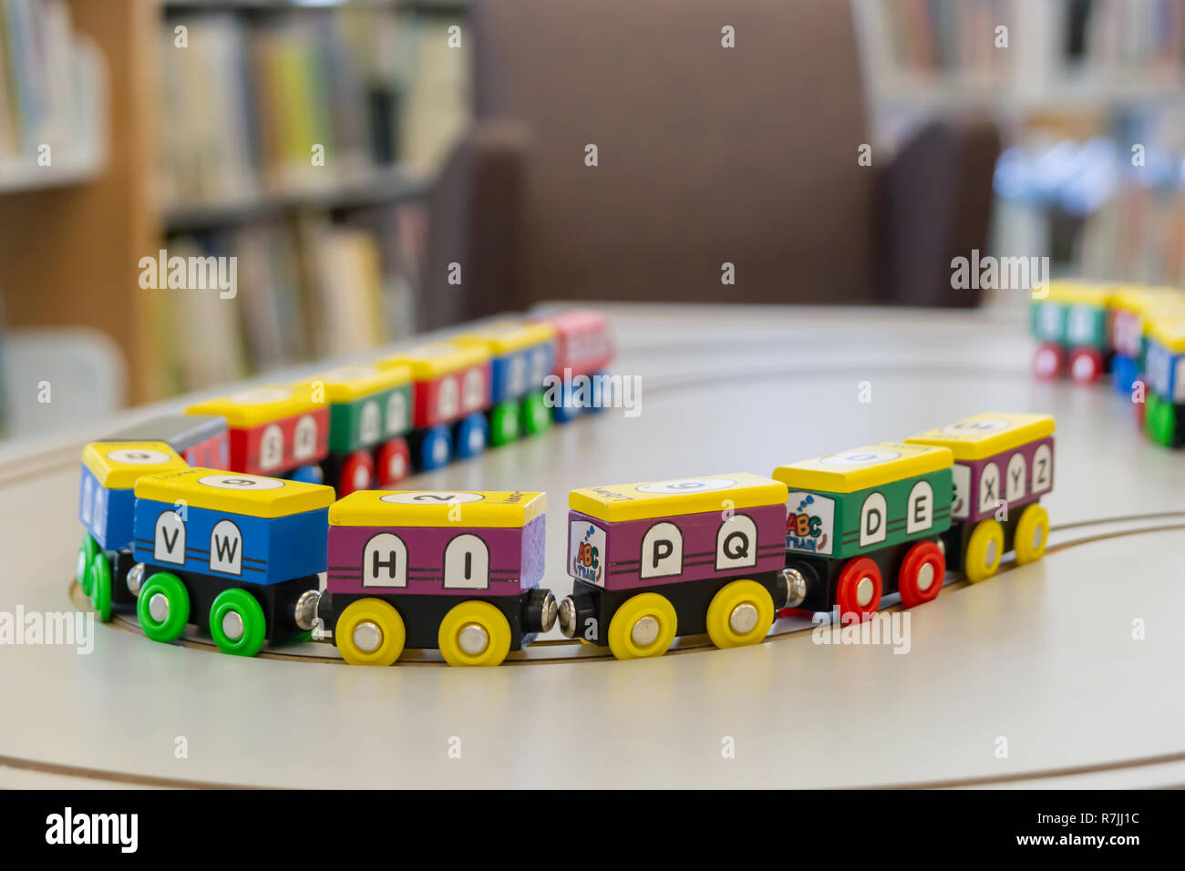 This colorful train with numbers and letters of the alphabet painted ...