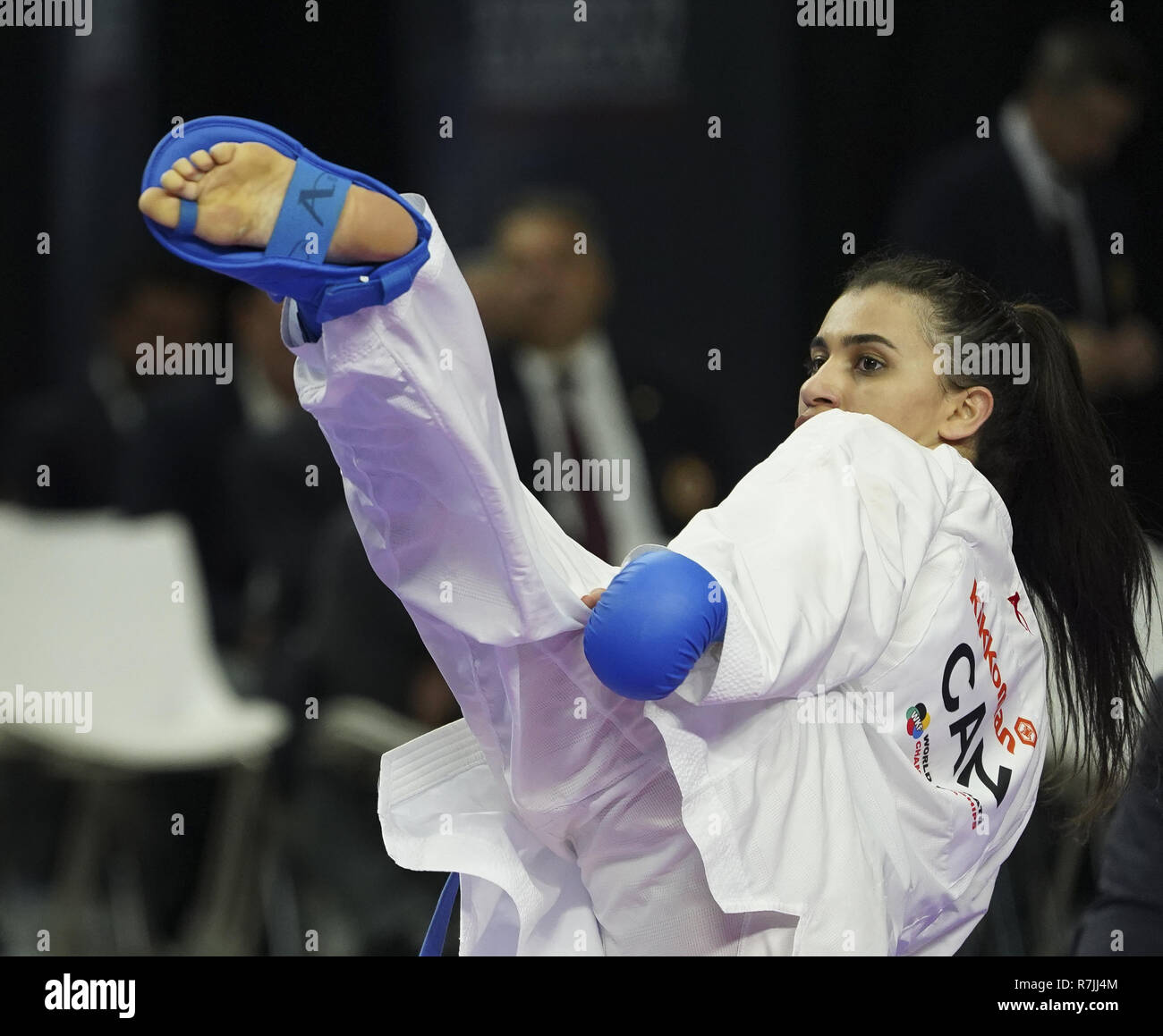 Women karate contestants compete in the elimination round of Kumite by ...
