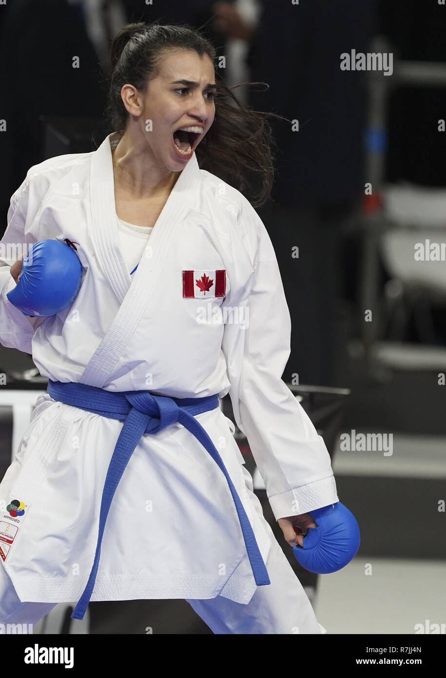 Women karate contestants compete in the elimination round of Kumite by ...
