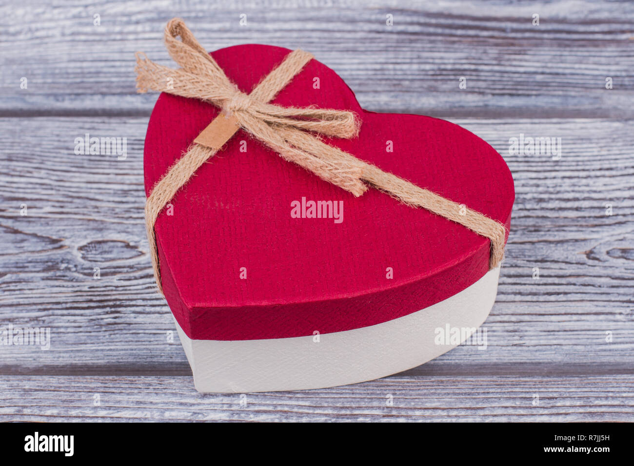 Romantic cardboard heart shaped gift box. Red heart shaped gift box ...