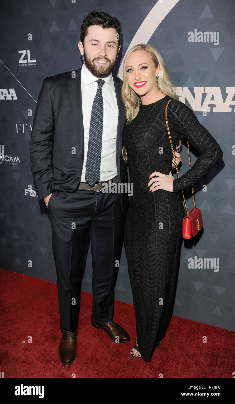 New York, NY - December 4, 2018: Baker Mayfield and Emily Wilkinson ...