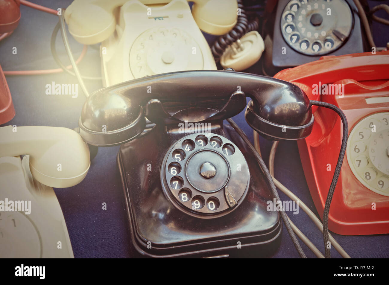 Old dialing telephones at a flea market Stock Photo - Alamy