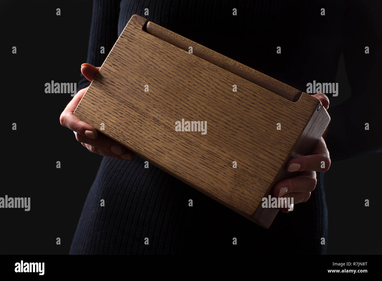 Wooden box in hand Stock Photo - Alamy