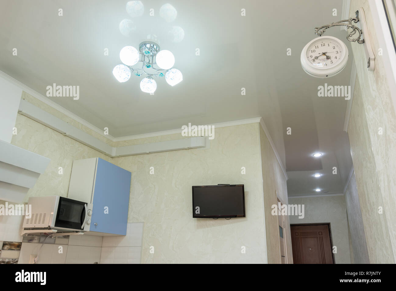 Stretch ceiling in the kitchen and hallway Stock Photo - Alamy