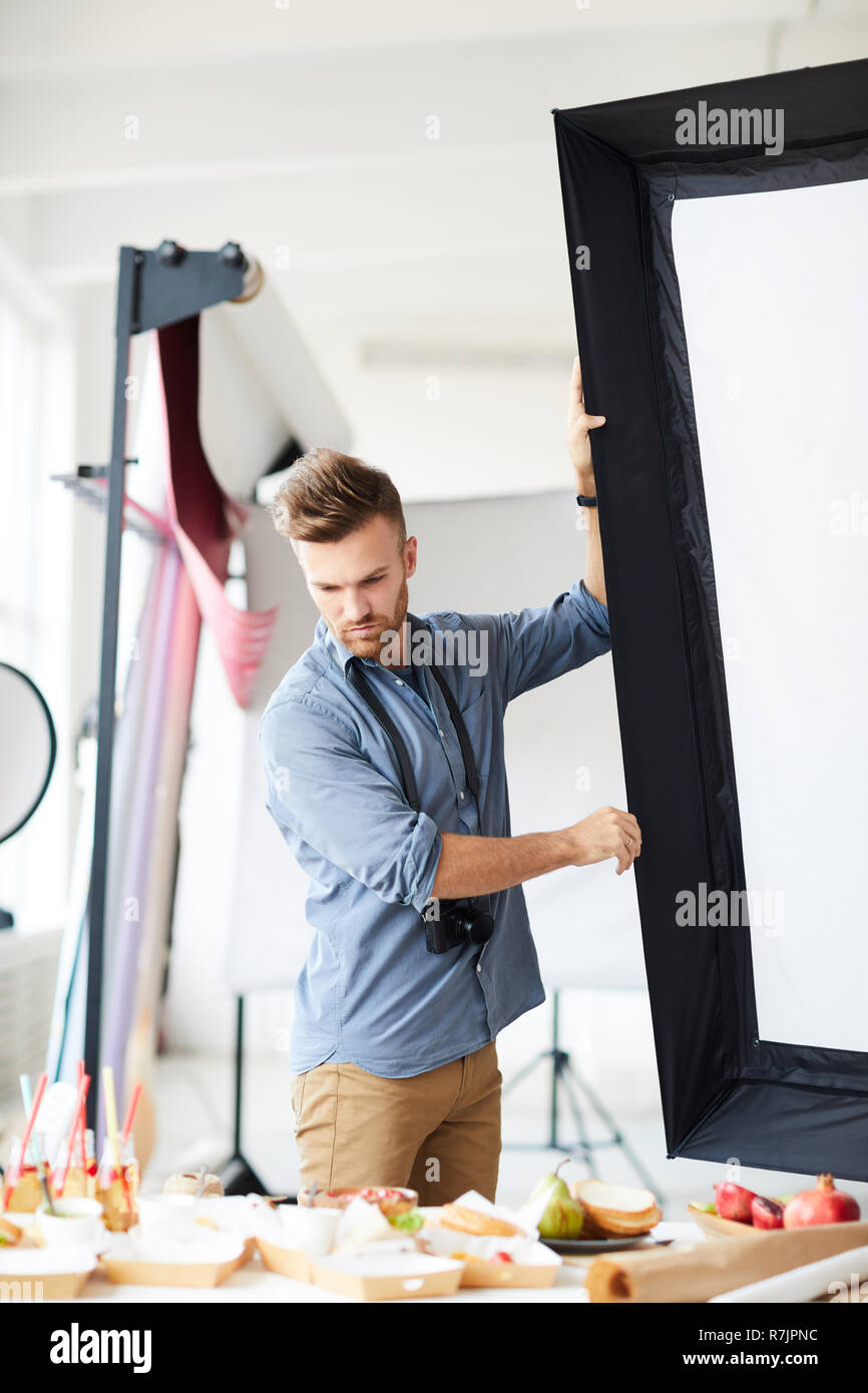 Adjusting light hi-res stock photography and images - Alamy