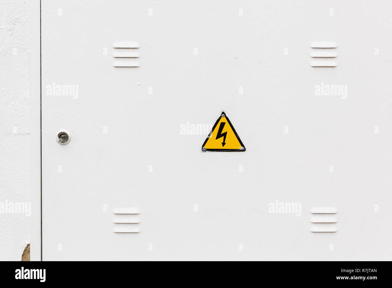 picture of a detail of a junction box with warning sign Stock Photo - Alamy