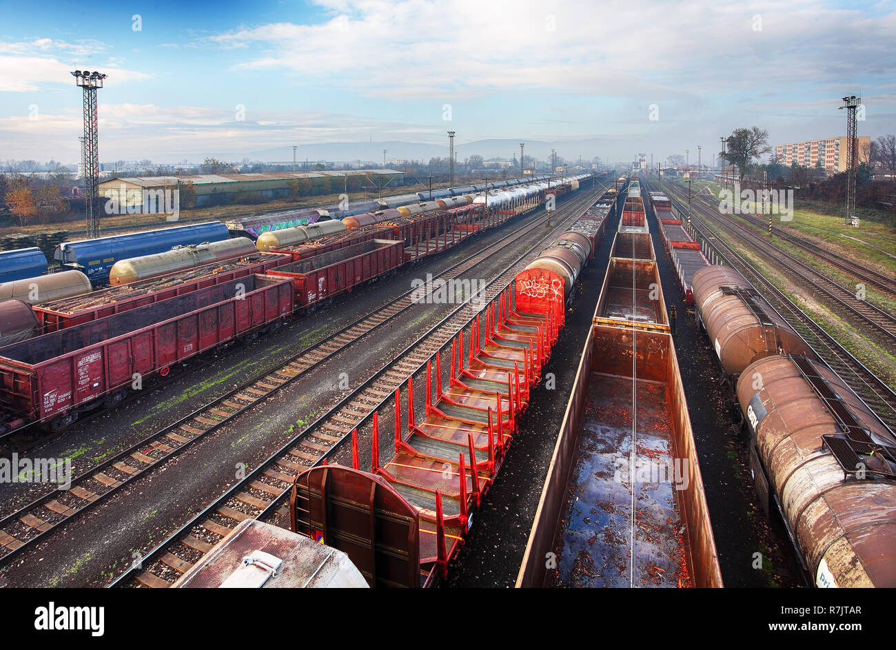 Cargo train platform at sunset with container Stock Photo - Alamy