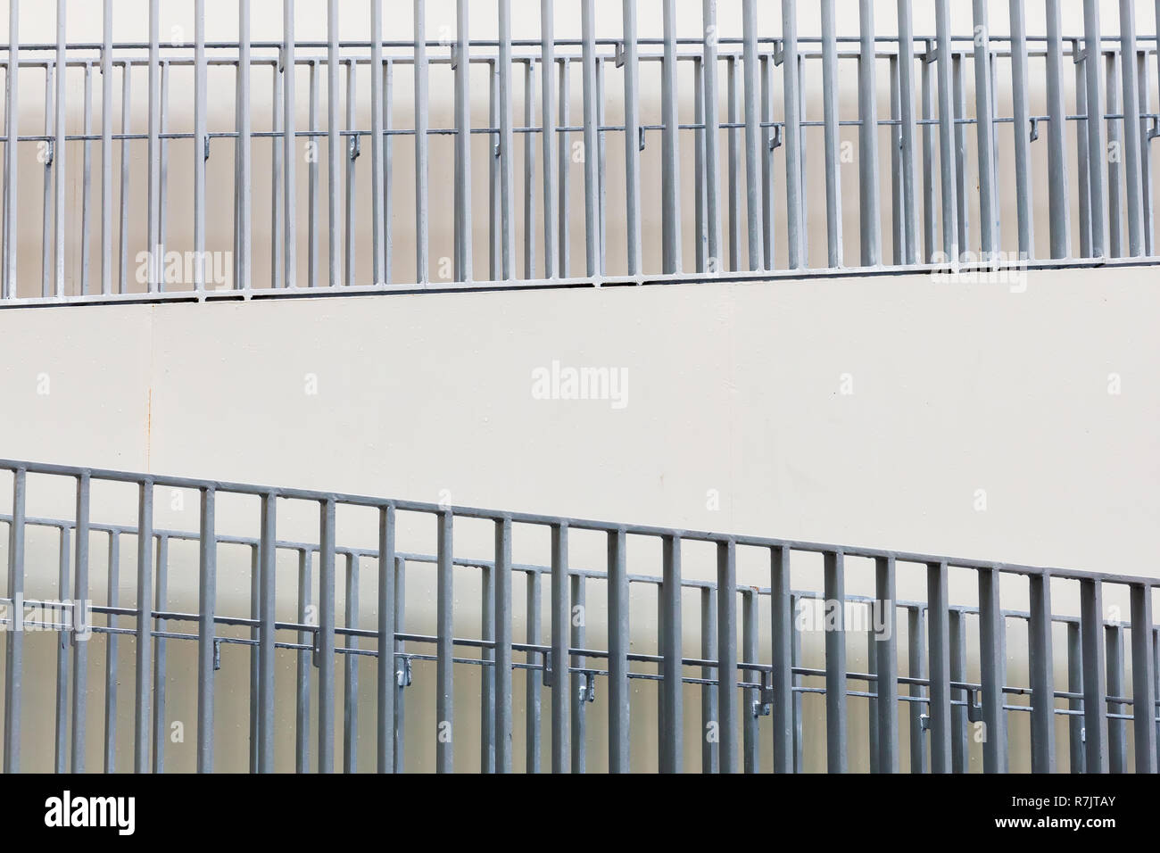 picture of handrails which lead upwards at a concrete wall Stock Photo ...