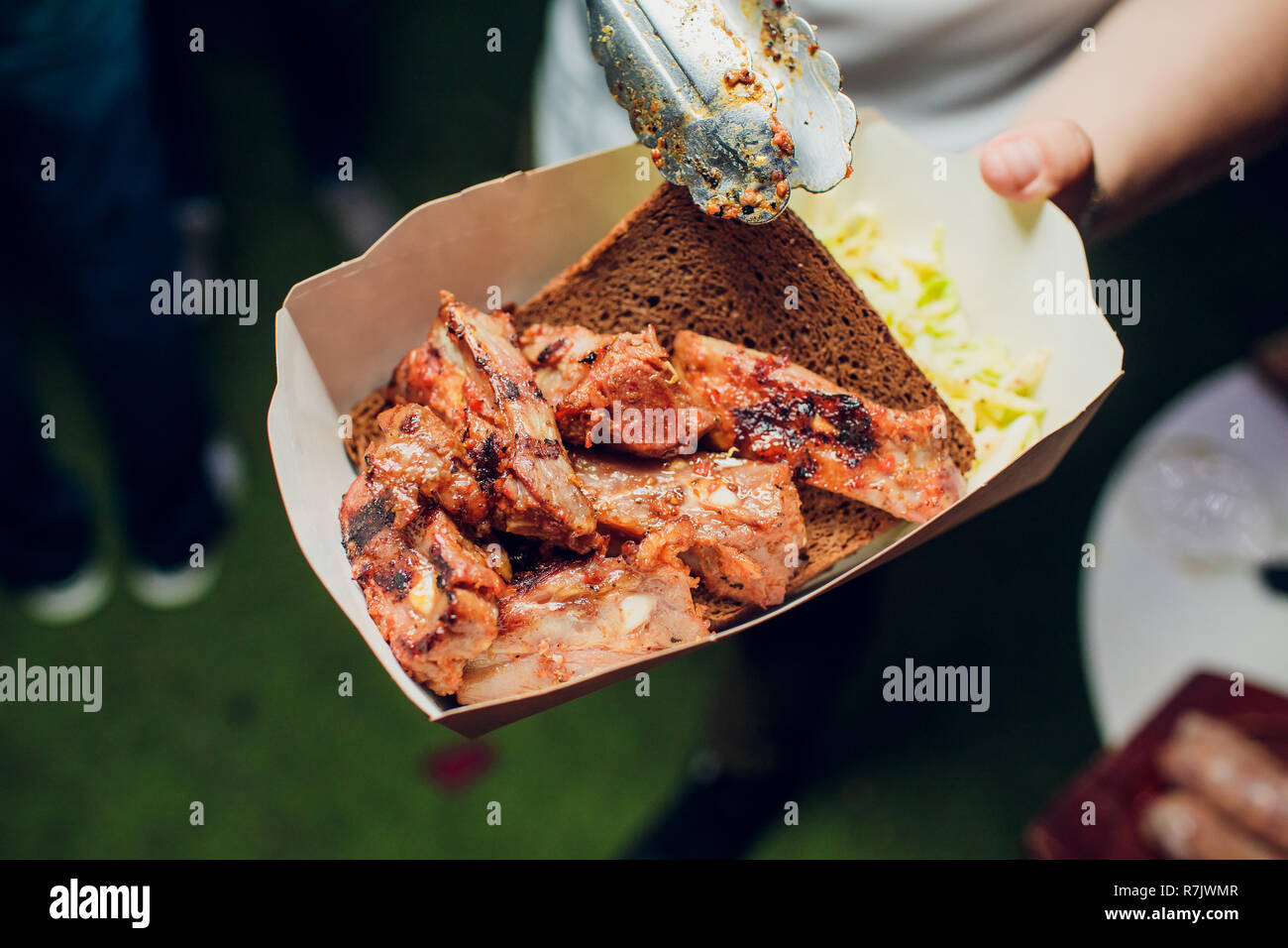 Dinner party, barbecue and roast pork night Stock Photo - Alamy