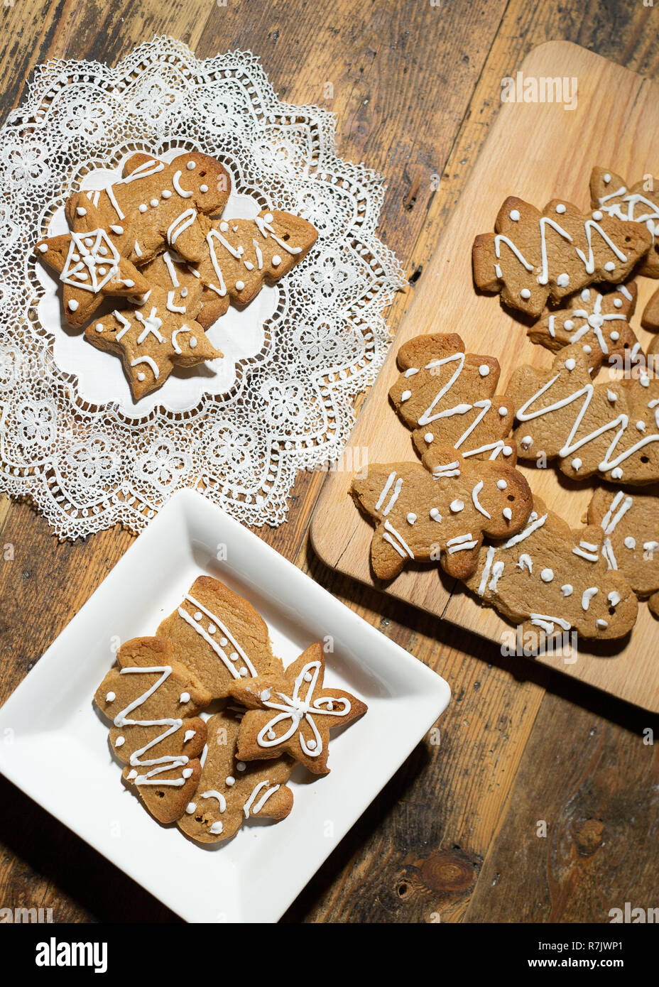 Flat lay image of three plates of gingerbread biscuits Stock Photo - Alamy