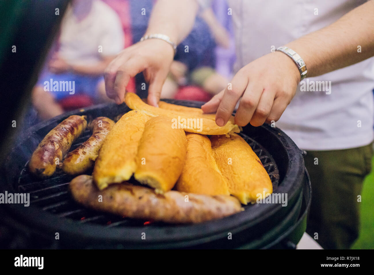 Dinner party, barbecue and roast pork night Stock Photo - Alamy