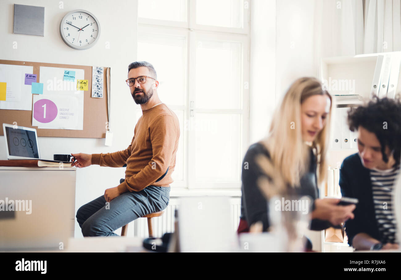 Working together in a modern office hi-res stock photography and images ...