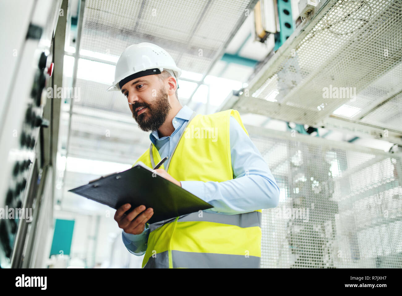 Portrait industrial worker writing hi-res stock photography and images ...