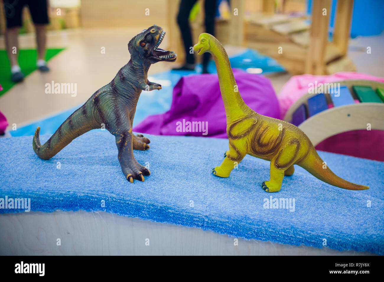 Dinosaur hunter on wild models background Stock Photo - Alamy