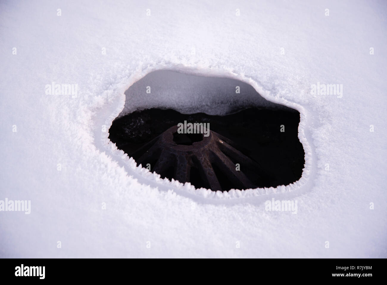 snow, sewage, hole Stock Photo - Alamy