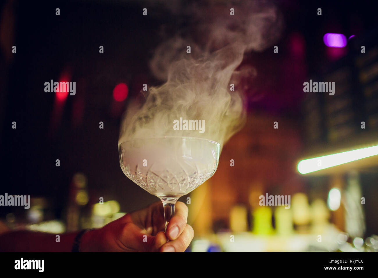 drink in glass with effect dry ice Stock Photo - Alamy