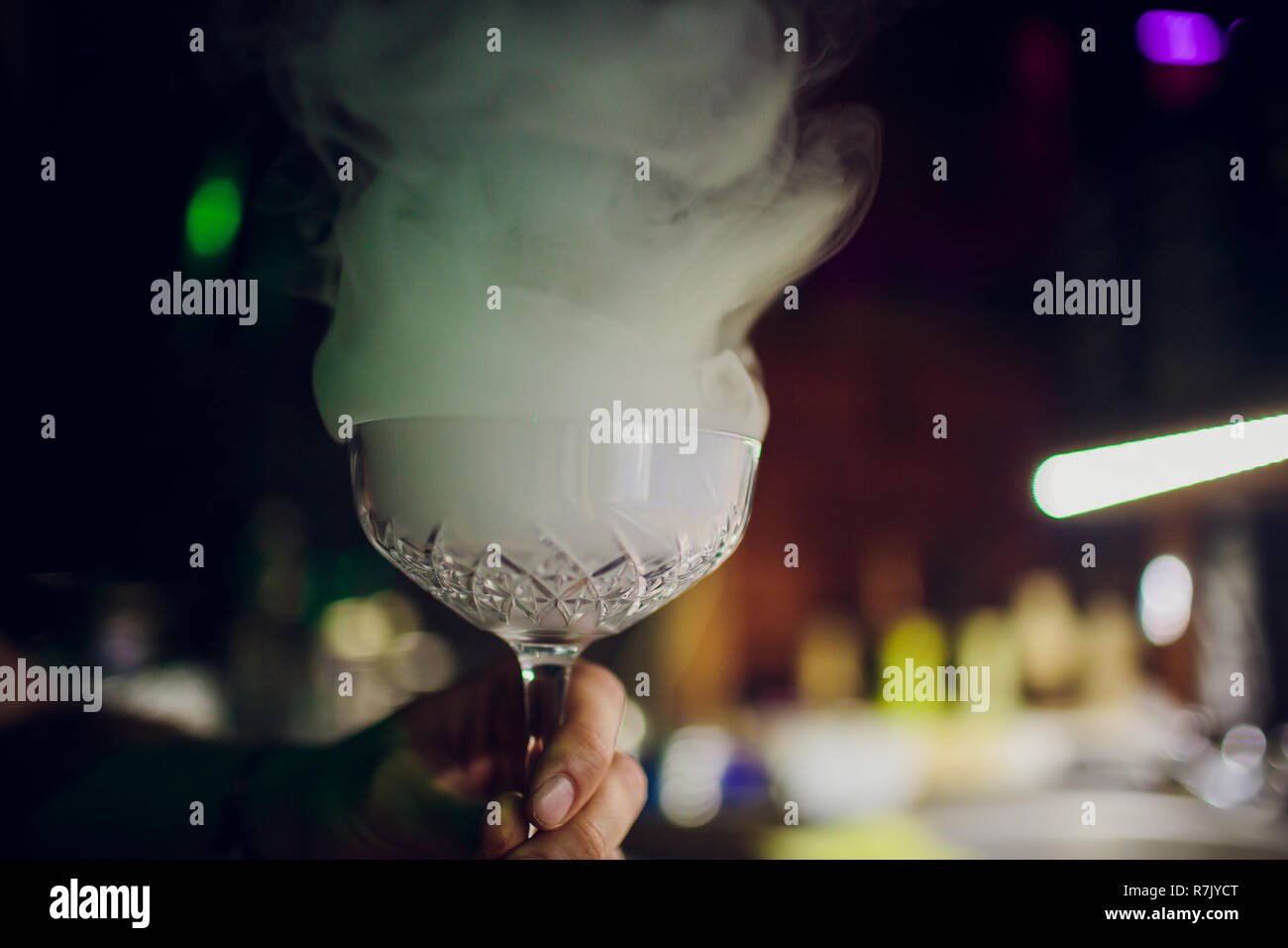 drink in glass with effect dry ice Stock Photo - Alamy