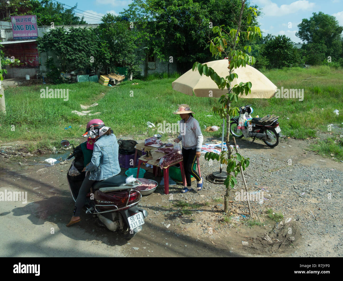 Female vietnamese motorcyclist hi-res stock photography and images - Alamy
