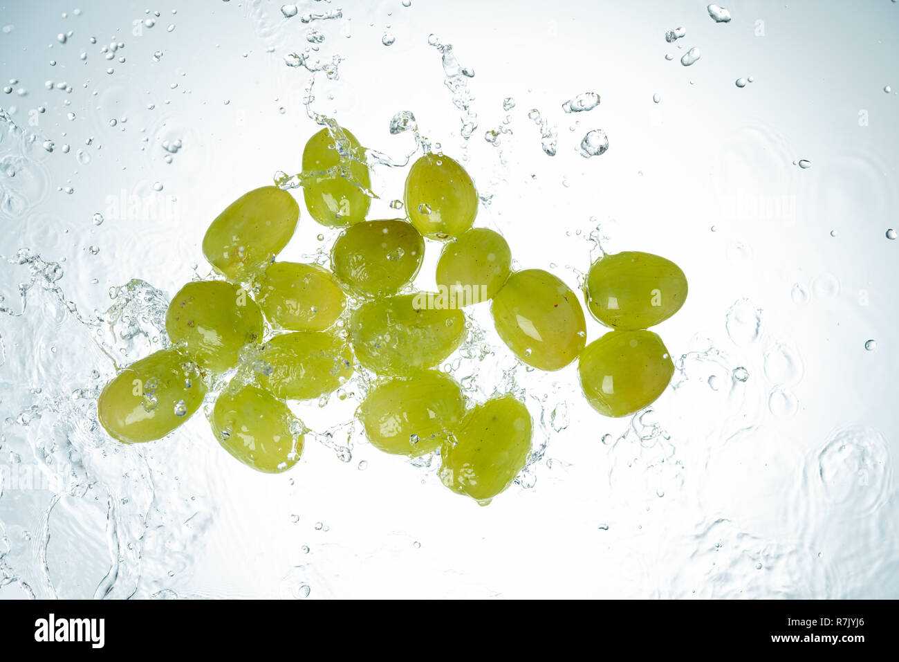 Green Grapes Water Splash on white background Stock Photo - Alamy
