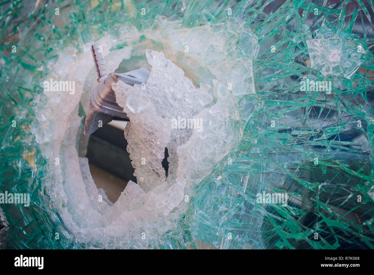 photo broken window looks like bullet hole Stock Photo - Alamy
