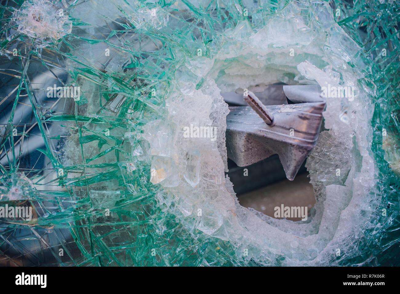 photo broken window looks like bullet hole Stock Photo - Alamy