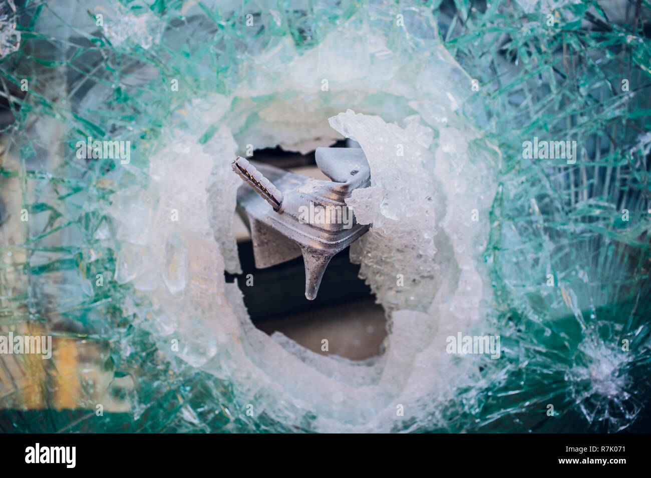 photo broken window looks like bullet hole Stock Photo - Alamy