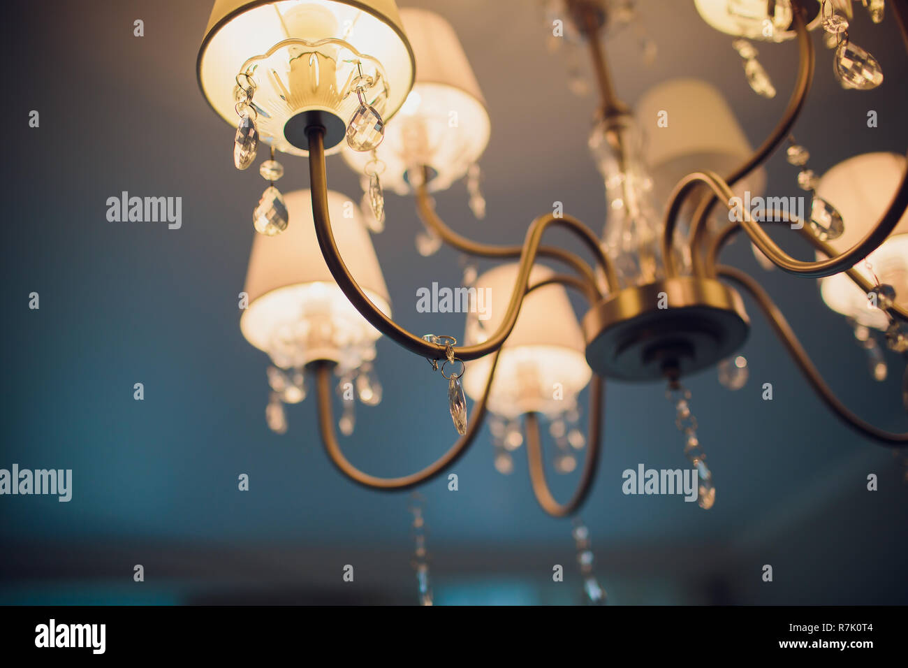 Close-up of a beautiful crystal chandelier Beautiful chandelier. luxury ...