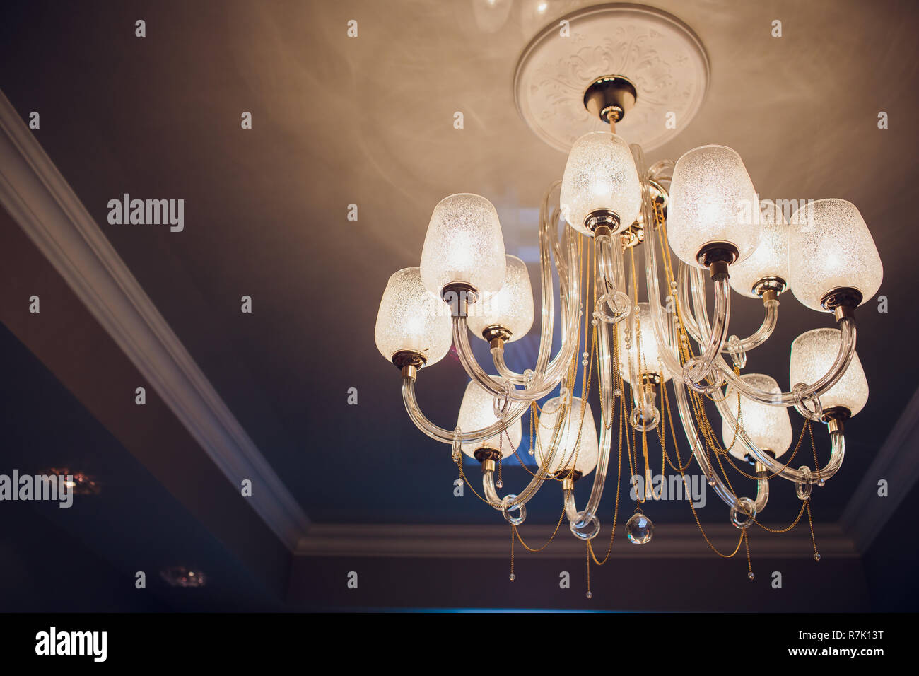 Close-up of a beautiful crystal chandelier Beautiful chandelier. luxury ...