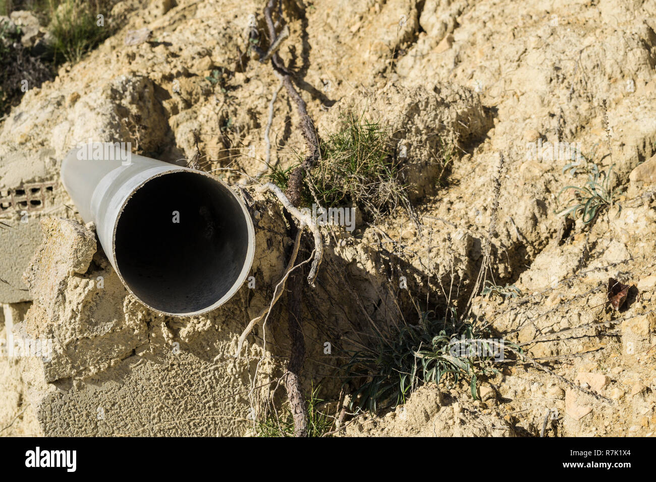 PVC rain pipe on a wall Stock Photo - Alamy