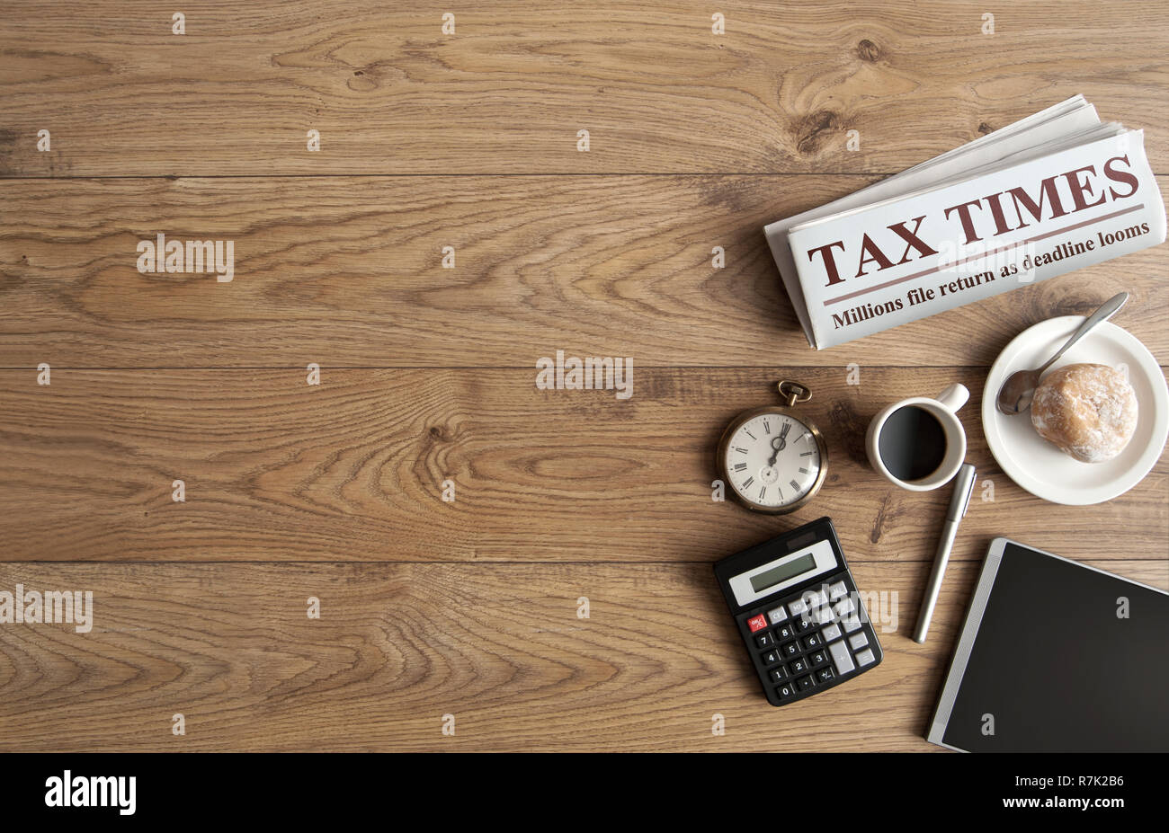 Tax times mock up newspaper with background space Stock Photo - Alamy