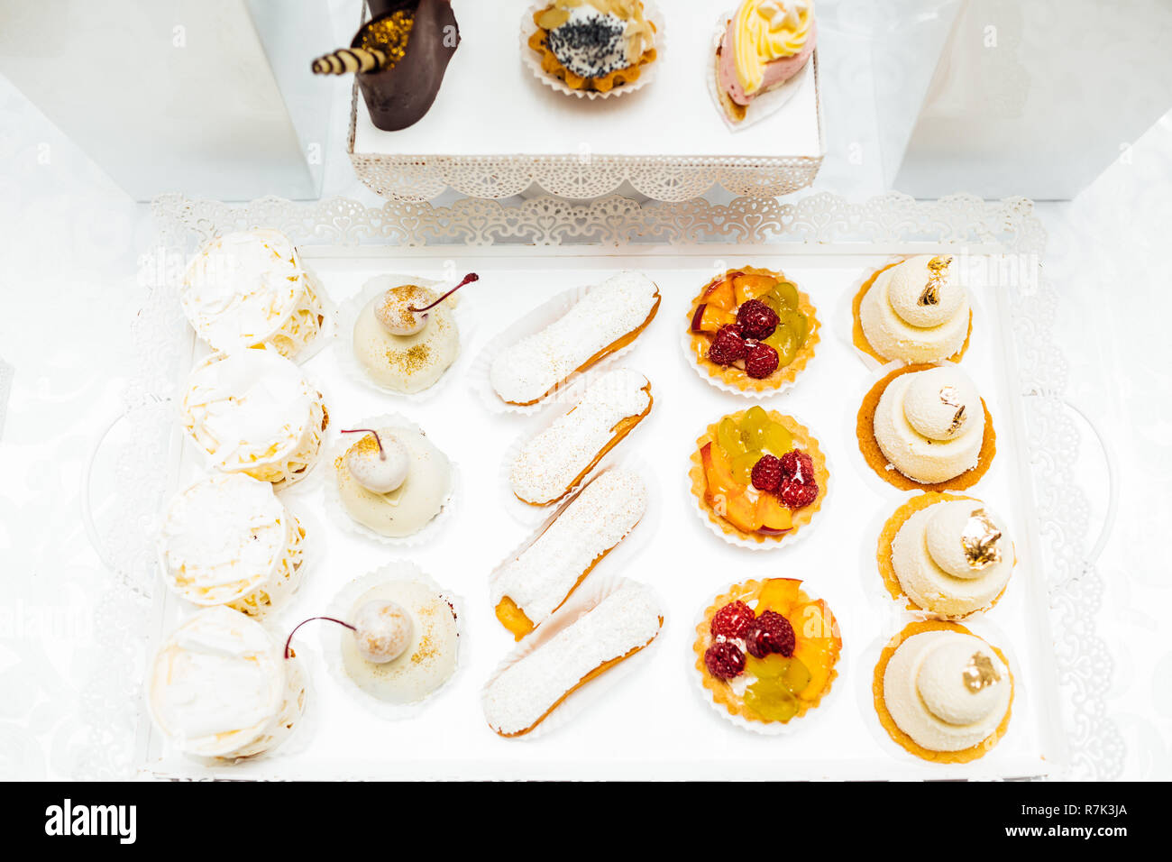 Table with different sweets for party. Candy bar Stock Photo - Alamy