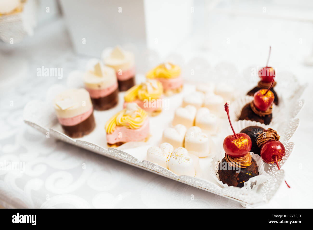 Table with different sweets for party. Candy bar Stock Photo - Alamy