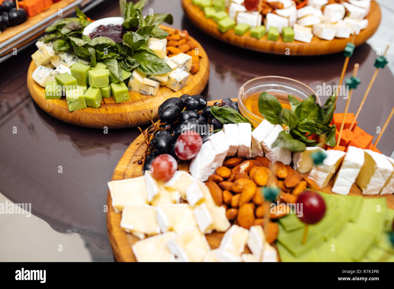 Tasting cheese dish . Delicious cheese on the table. Table setti Stock ...