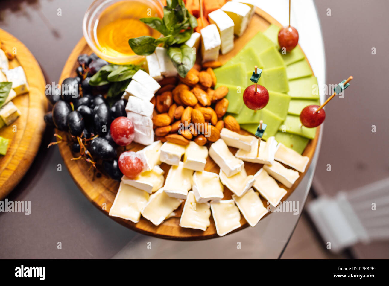 Tasting cheese dish . Delicious cheese on the table. Table setti Stock ...