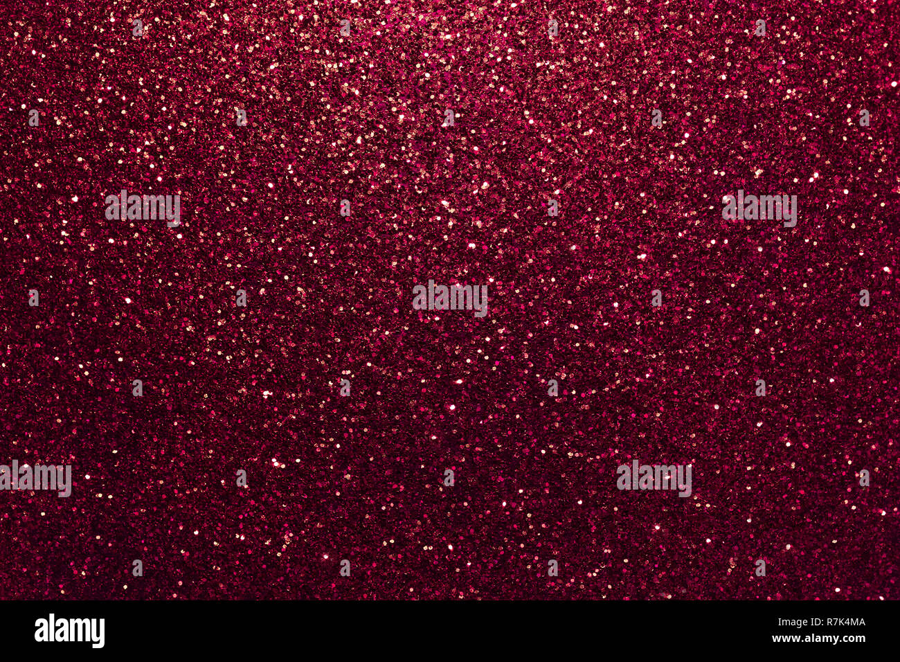 Dark red sparkling background from small sequins, closeup. Brilliant ...