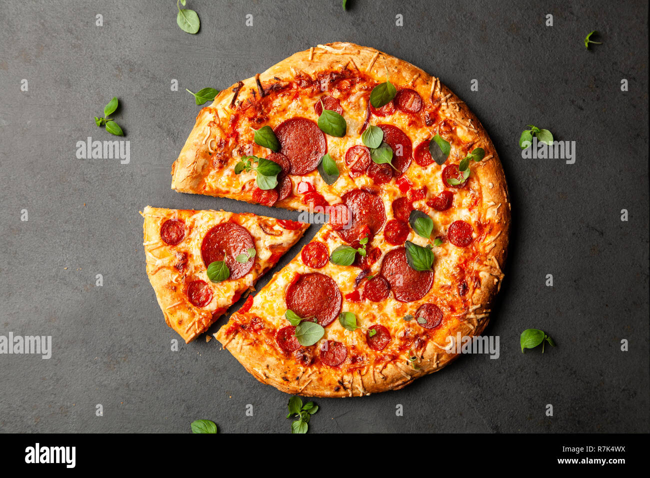 Pizza with salami and chorizo topping Stock Photo - Alamy