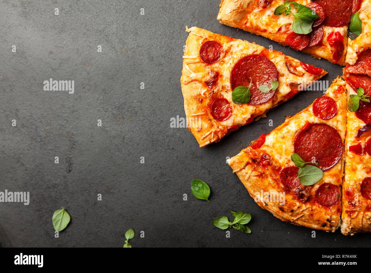Pizza with salami and chorizo topping Stock Photo - Alamy